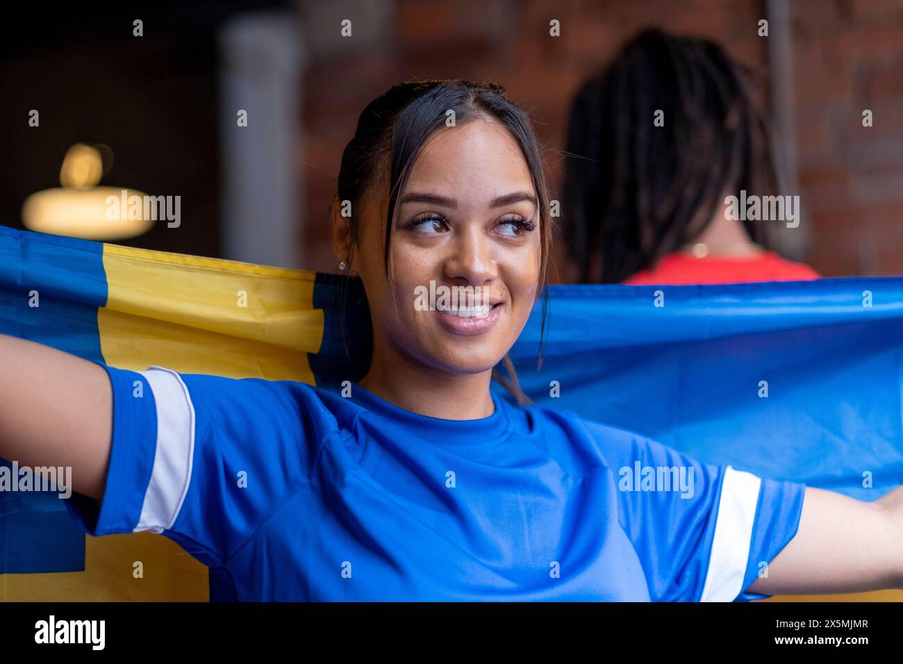 Woman holding national flag hi-res stock photography and images - Alamy