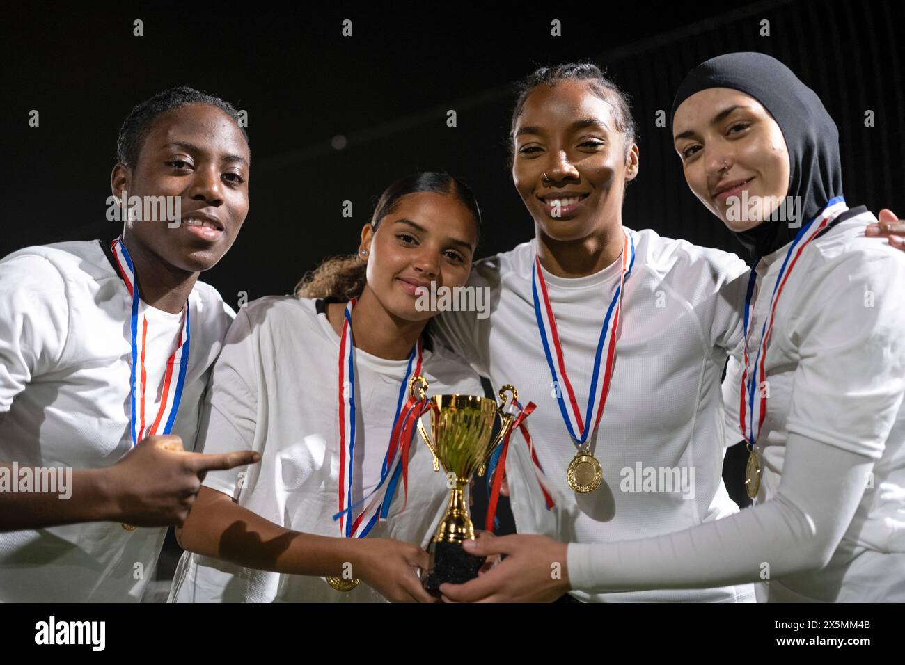 Team of female soccer players celebrating victory Stock Photo - Alamy