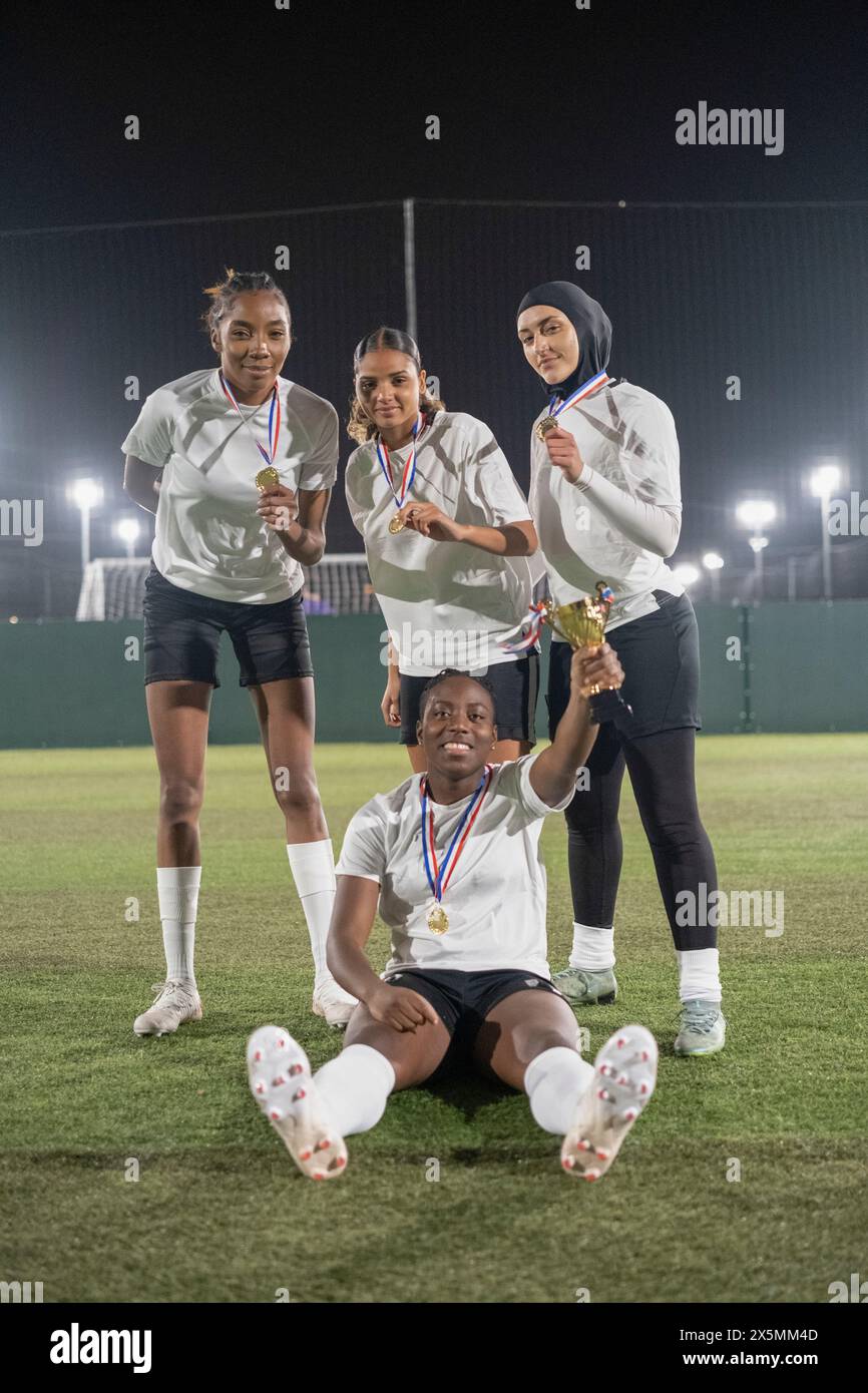 Team of female soccer players celebrating victory Stock Photo - Alamy