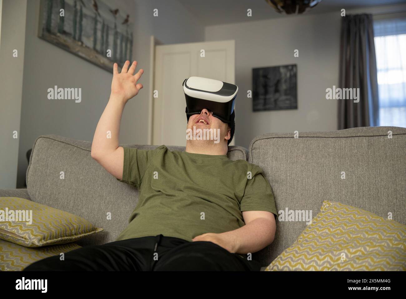 Vr man sofa hi-res stock photography and images - Alamy
