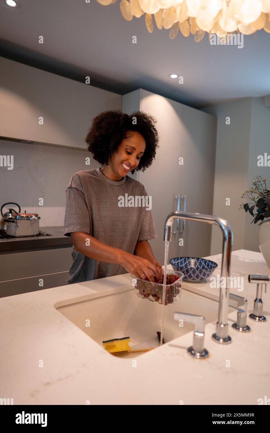 Standing smiling washing hair hygiene hi-res stock photography and images - Alamy