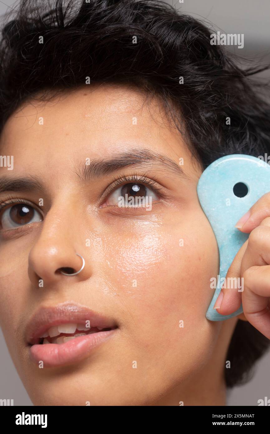 Woman gua sha tool hi-res stock photography and images - Alamy