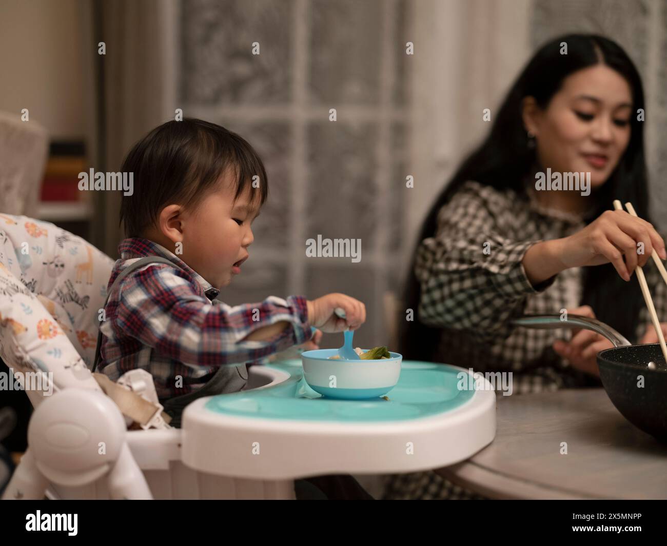 Baby table mother hi-res stock photography and images - Alamy
