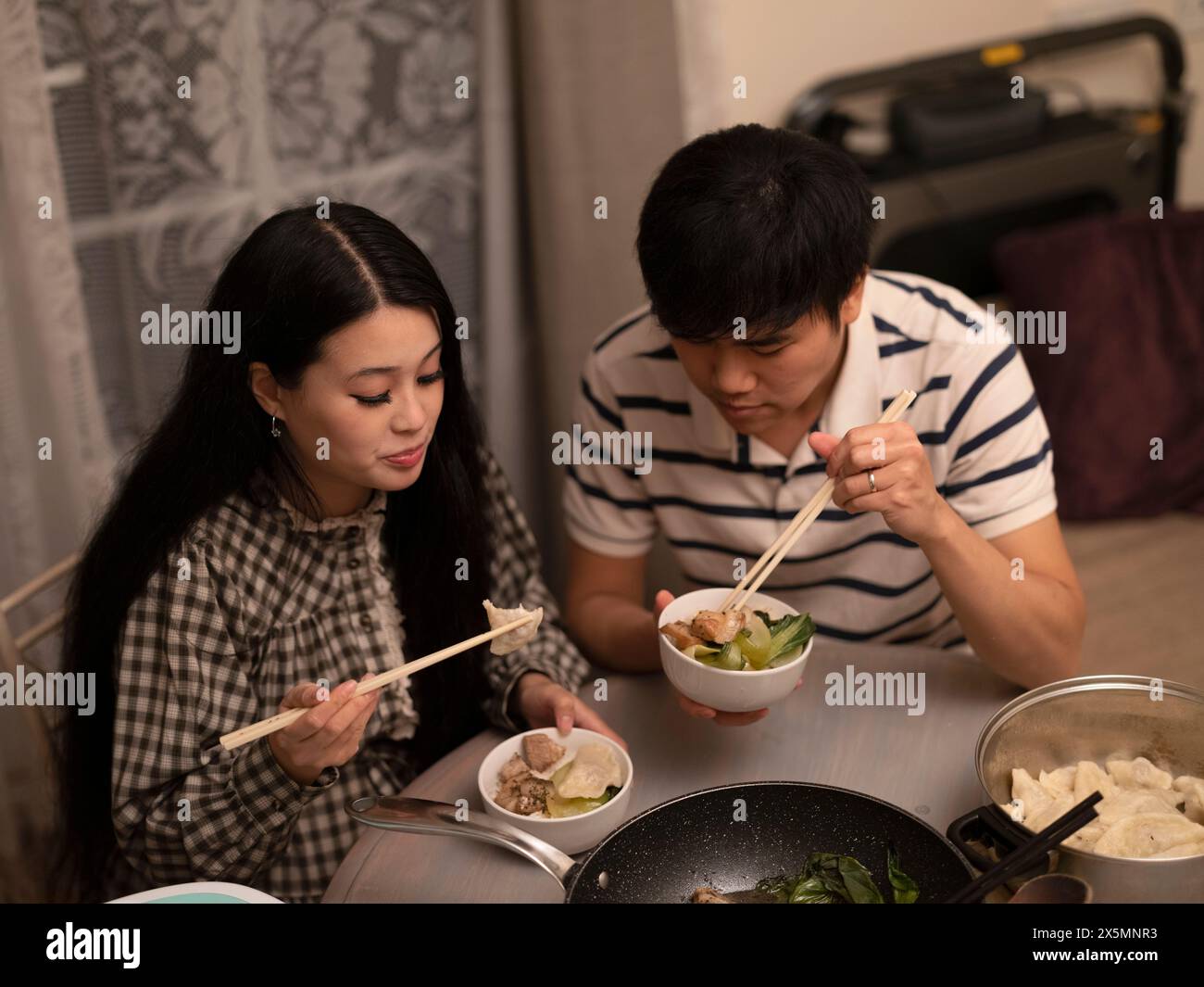 Dinner couple eating hi-res stock photography and images - Alamy