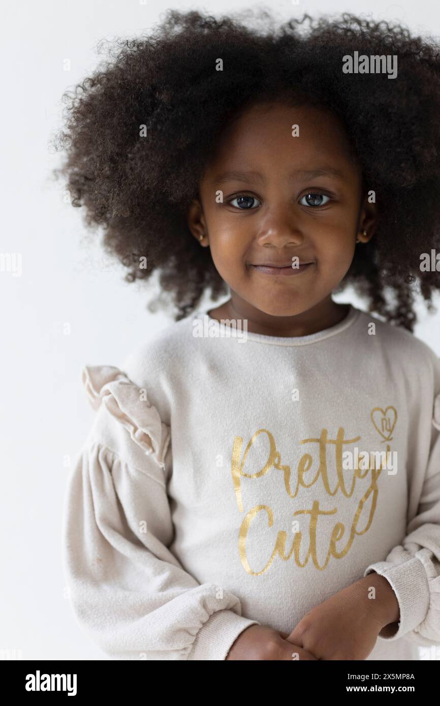 Pretty smiling girl looking camera hi-res stock photography and images ...