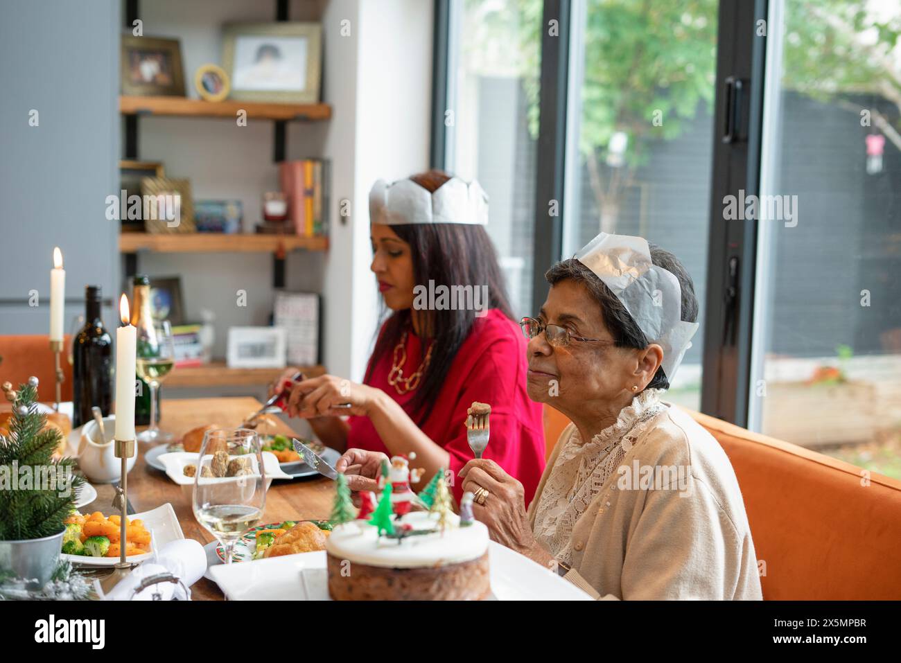 Two people wearing christmas hi-res stock photography and images - Alamy