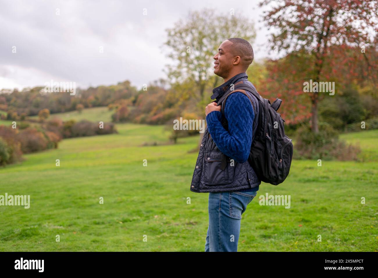 Black man in backpack hi-res stock photography and images - Alamy