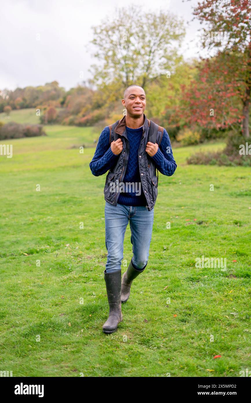 African black man walking in hi-res stock photography and images - Alamy
