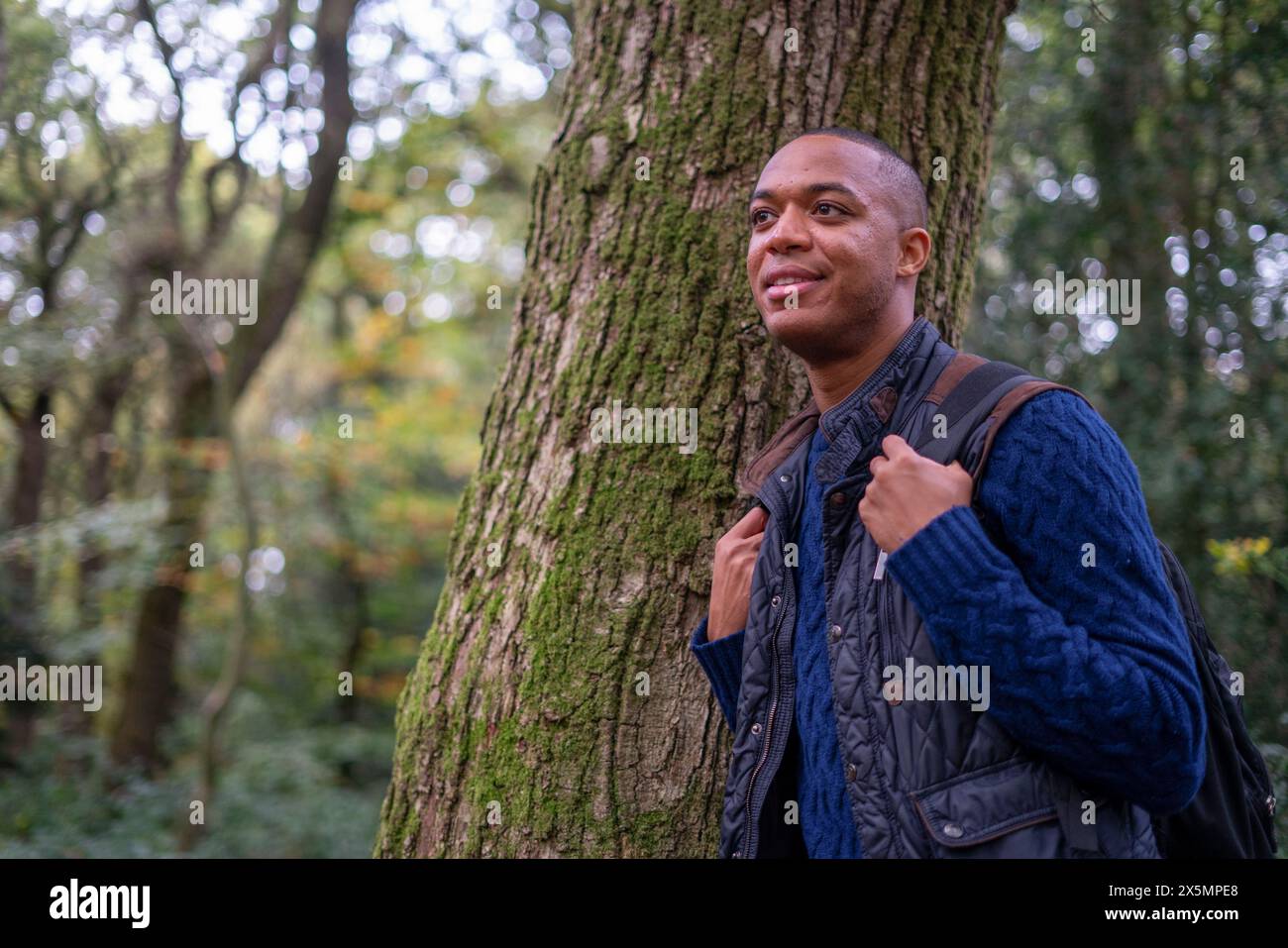 Man standing tree hi-res stock photography and images - Alamy