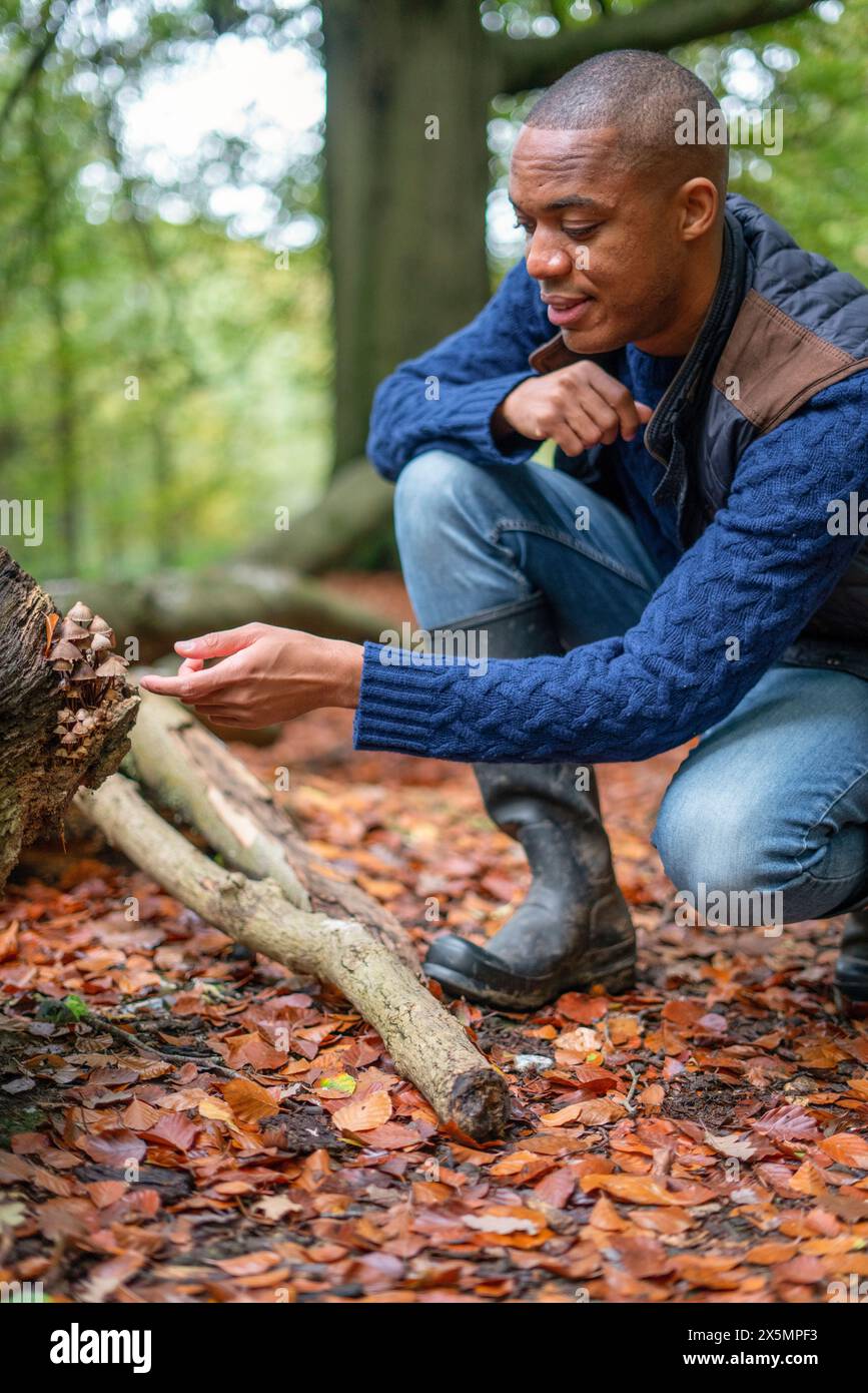 Reaching black man in hi-res stock photography and images - Alamy