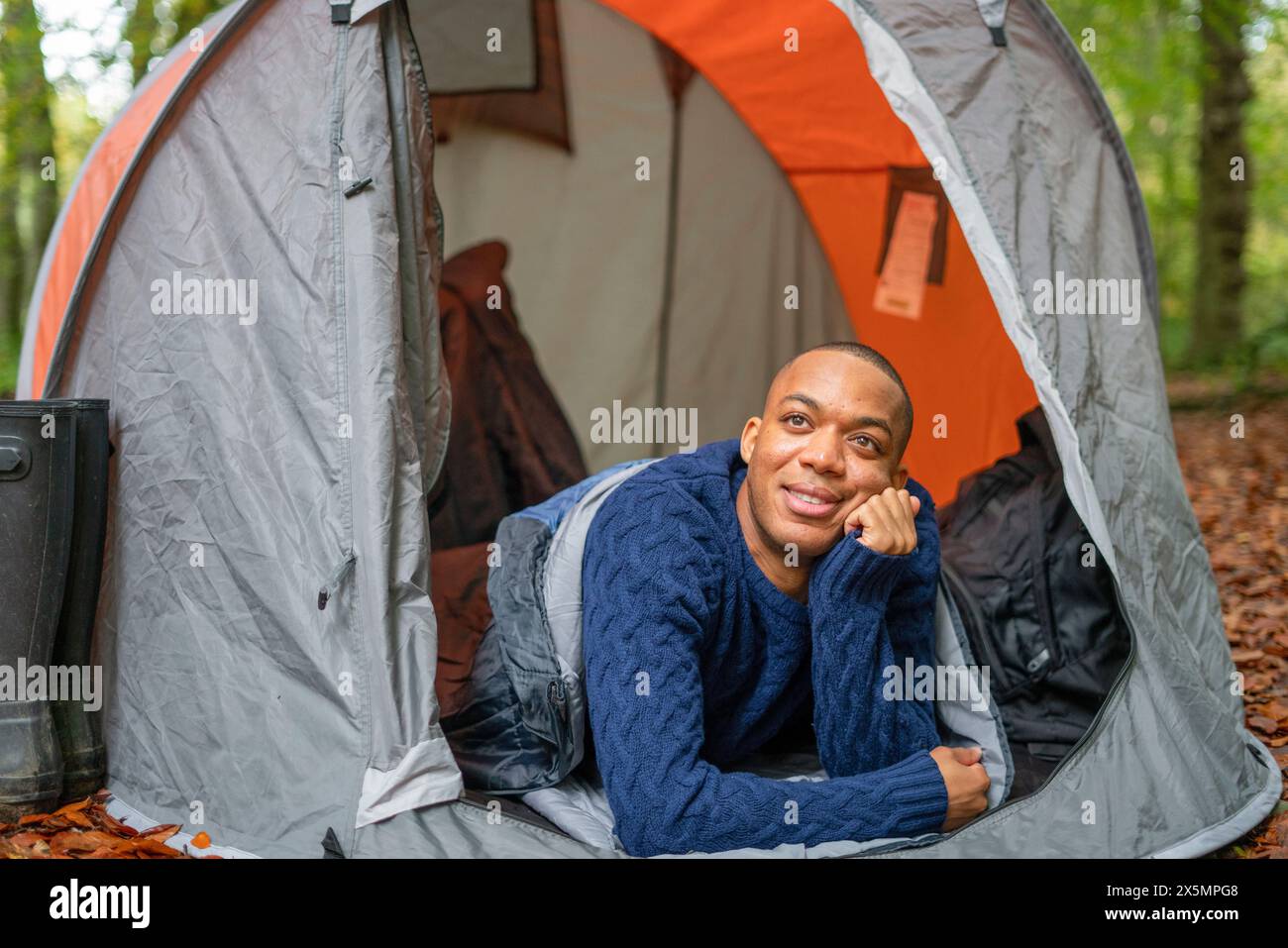 Man sleeping in tent hi-res stock photography and images - Alamy