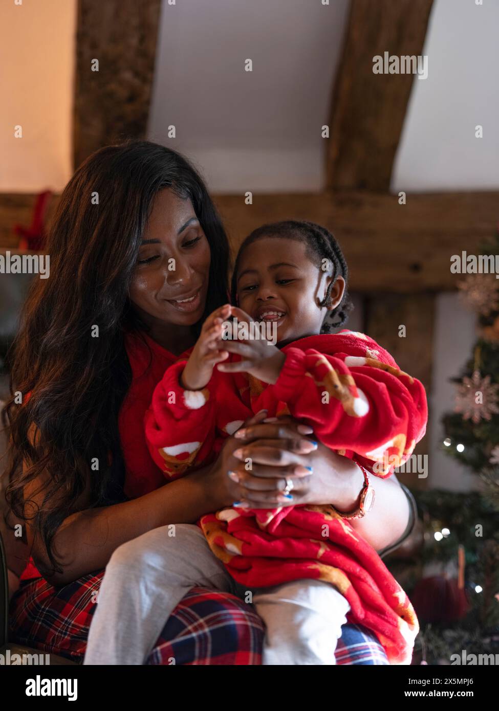 Mom embracing son hi-res stock photography and images - Alamy