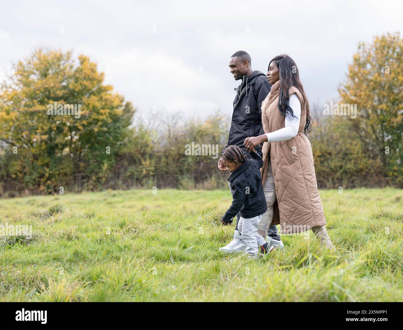Walking with parents hi-res stock photography and images - Alamy