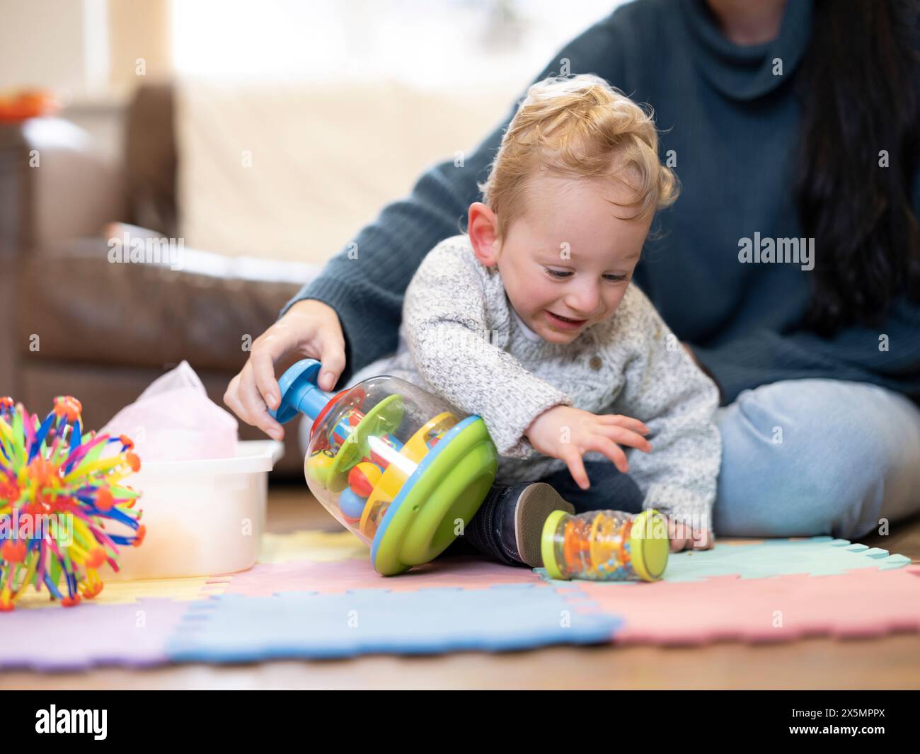 23 months reaching hi-res stock photography and images - Alamy