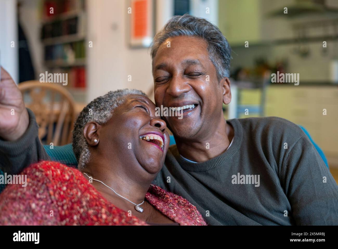 Laughing at home hi-res stock photography and images - Alamy
