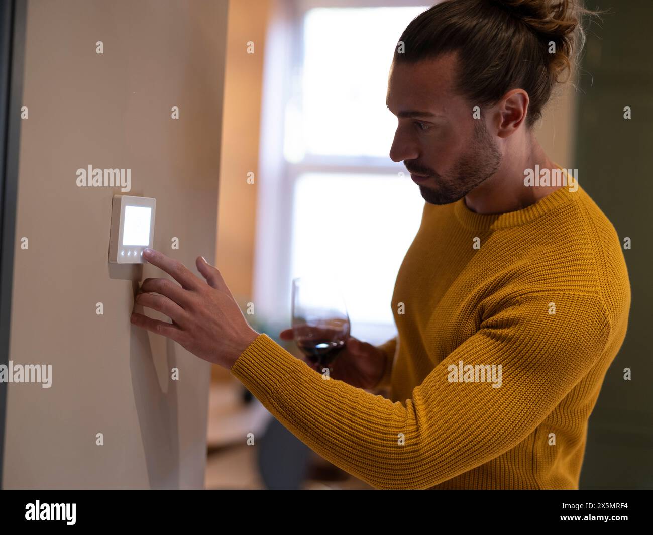 Home heating people hi-res stock photography and images - Alamy