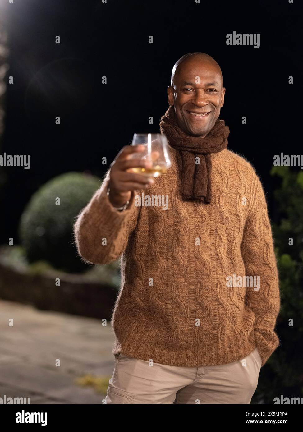 African man portrait smiling night hi-res stock photography and images ...