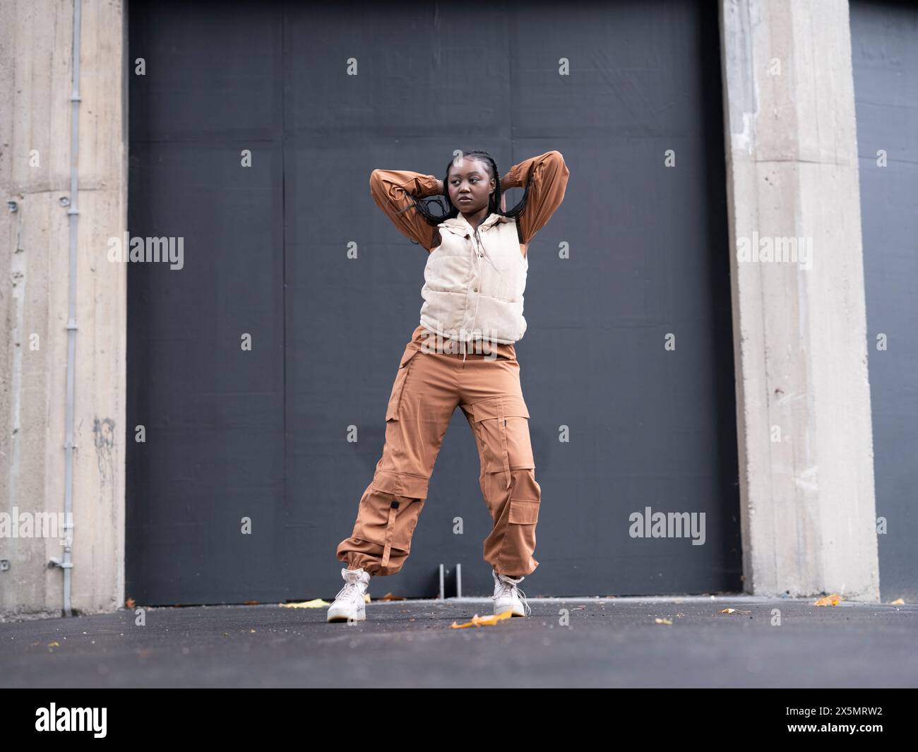 Woman dancing in city hi-res stock photography and images - Alamy