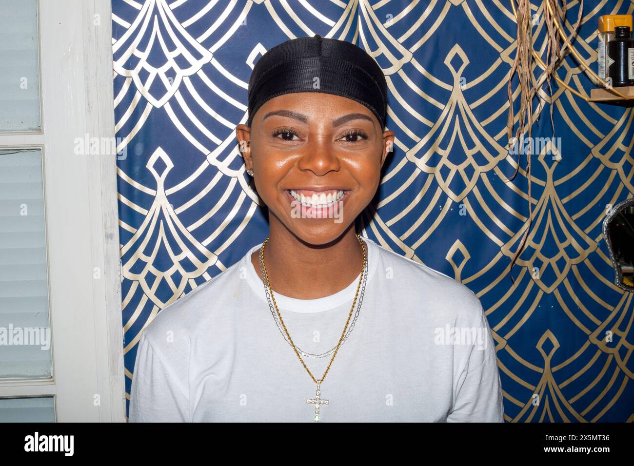 Portrait woman wearing cap hi-res stock photography and images - Alamy