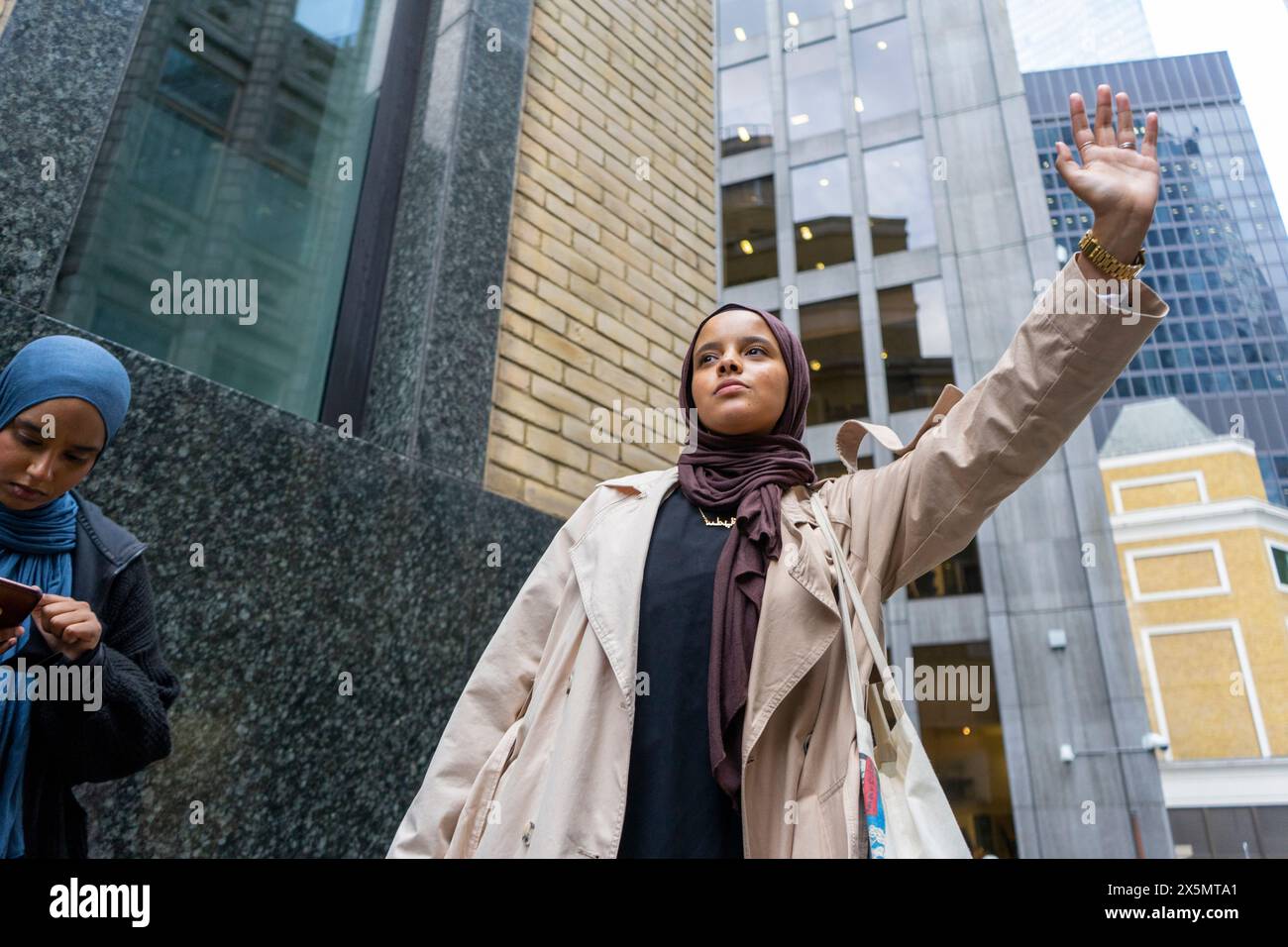 Waiting two young women hi-res stock photography and images - Alamy