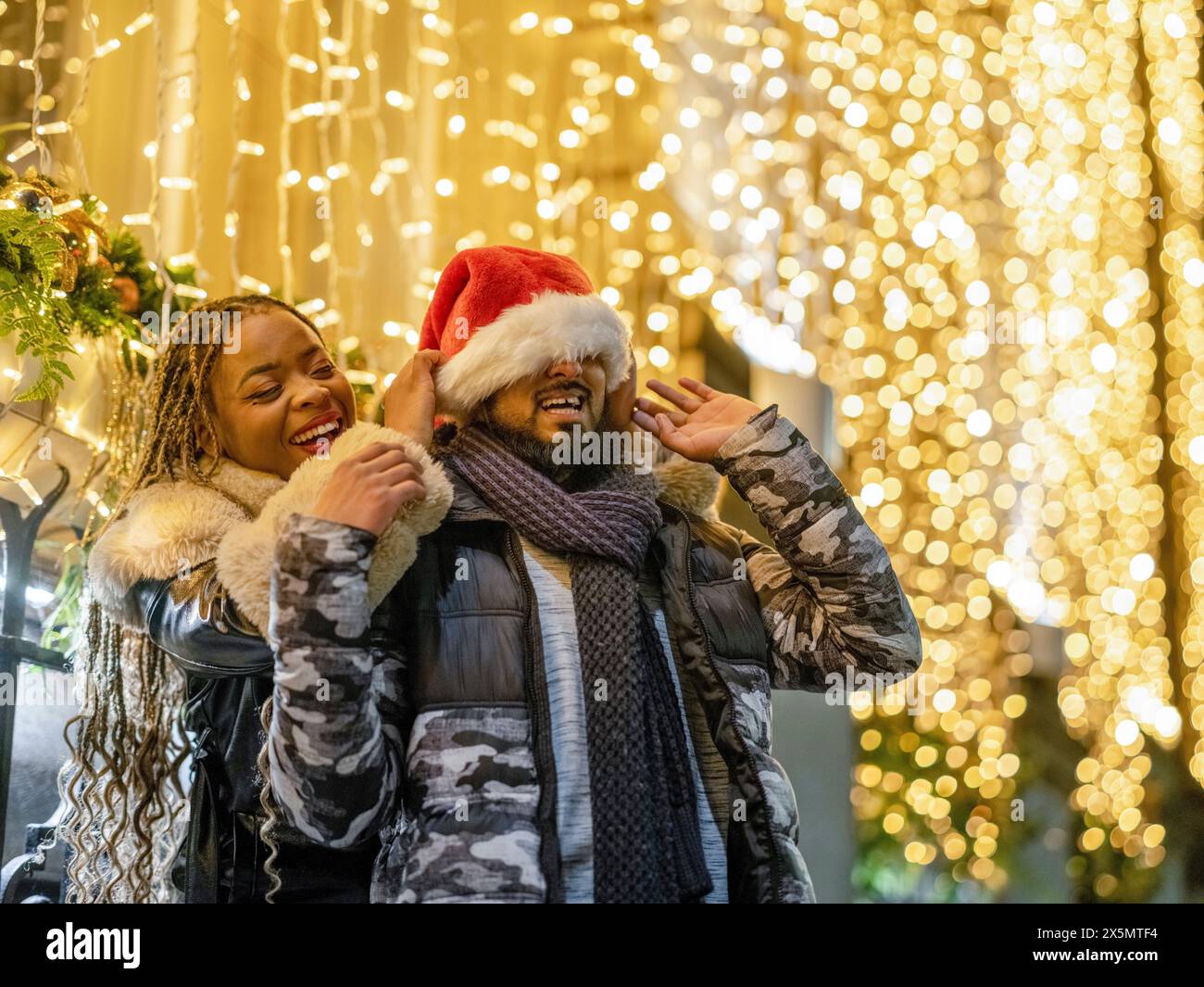 Putting up lights hi-res stock photography and images - Alamy