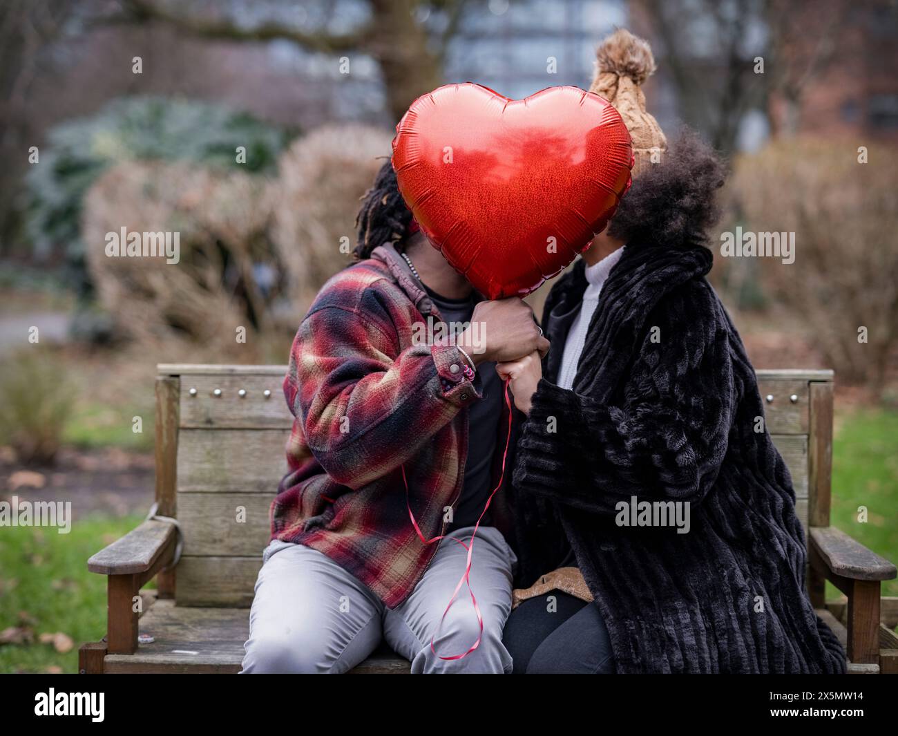 Multiethnic young couple behind hi-res stock photography and images - Alamy