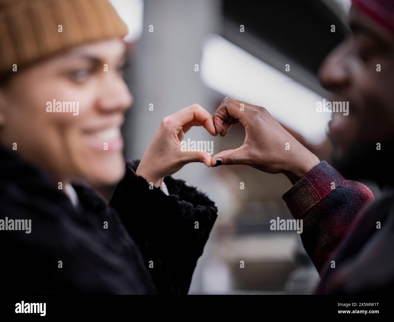 Couple hand heart hi-res stock photography and images - Alamy