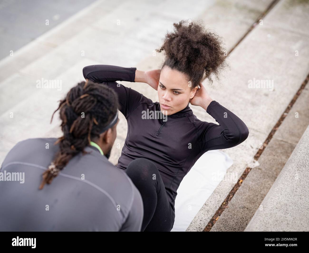 Woman outdoor workout sit hi-res stock photography and images - Alamy
