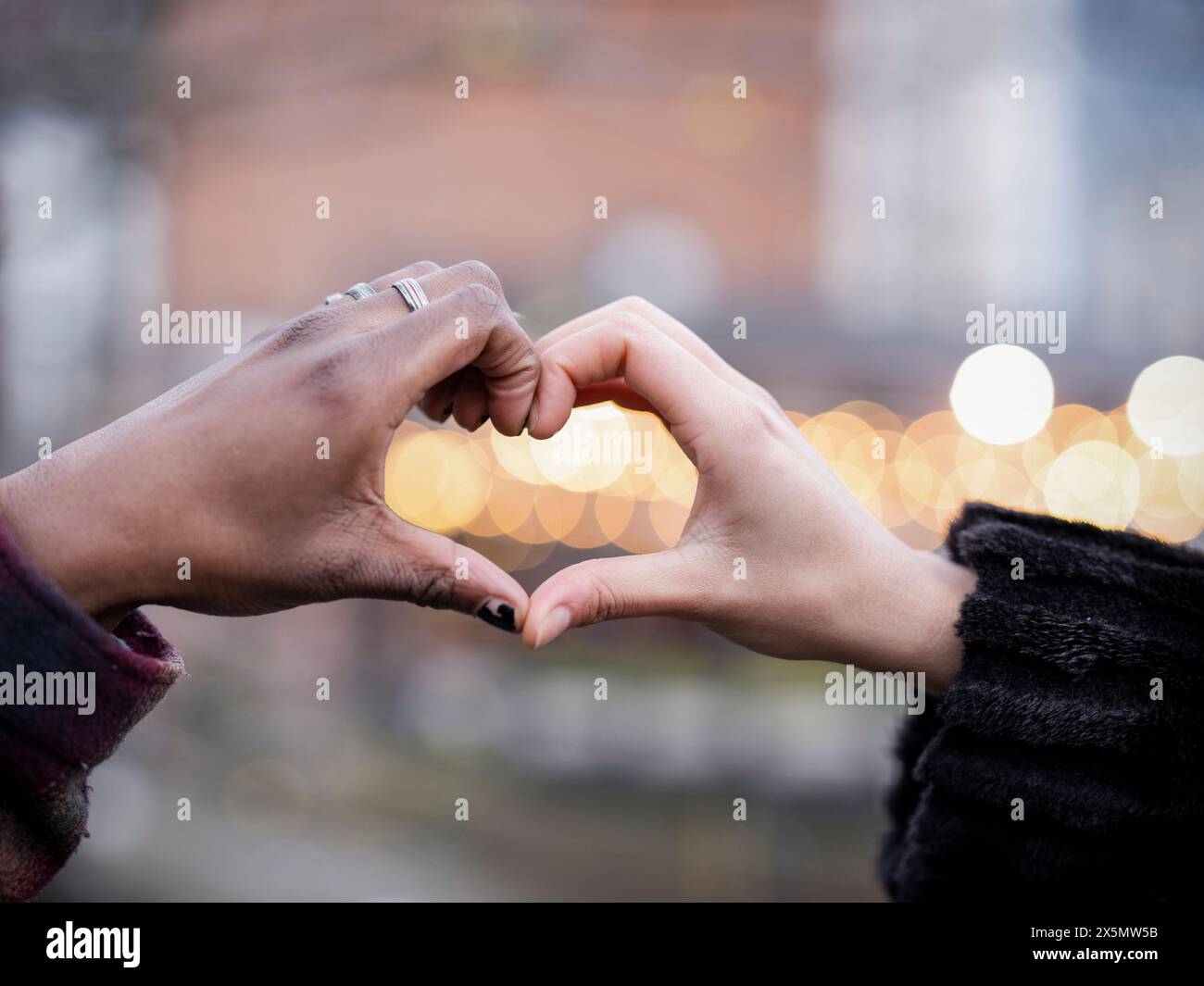 Hands up heart hi-res stock photography and images - Alamy