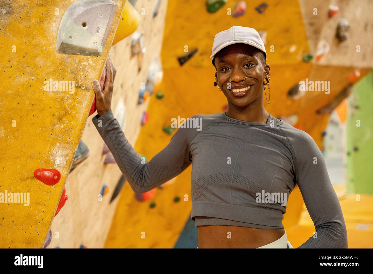Portrait smiling woman climbing hi-res stock photography and images - Alamy