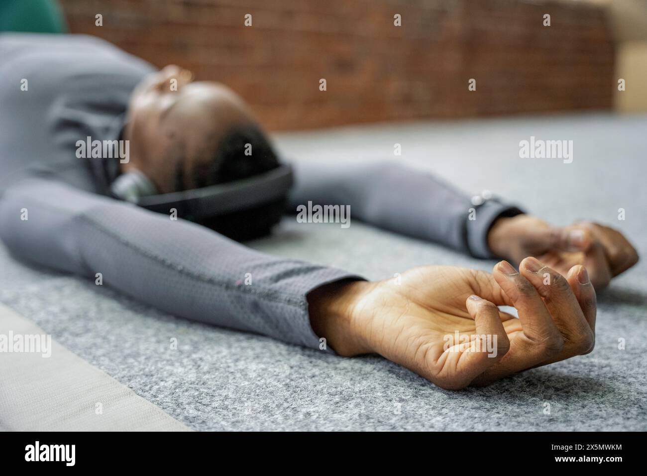 Athletic woman stretching at gym Stock Photo - Alamy