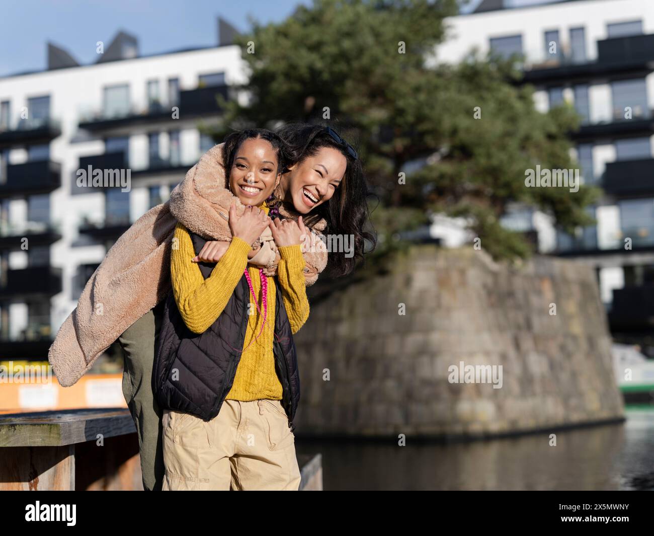 Two young women in urban setting, portrait Stock Photo - Alamy