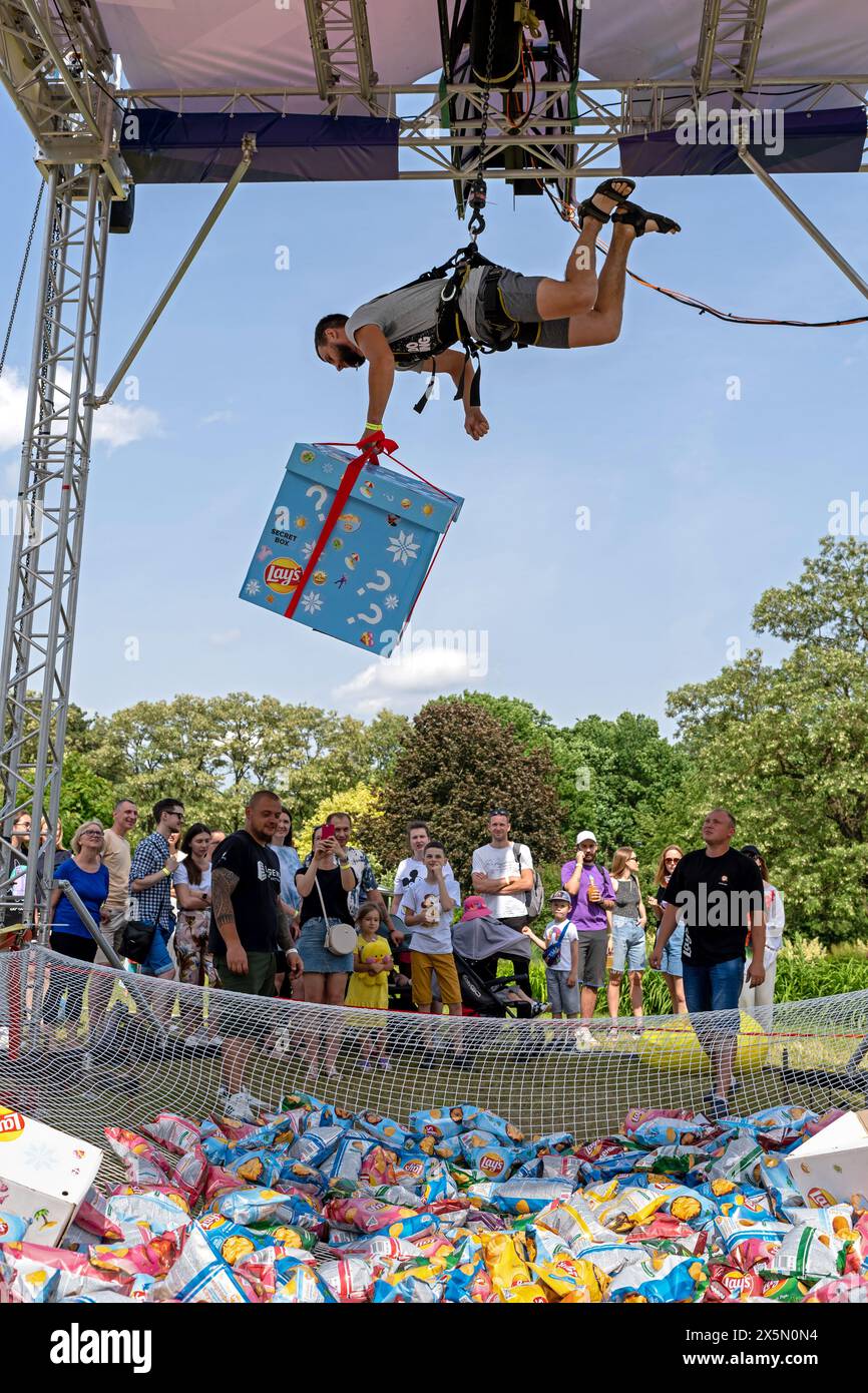 Large crane machine with real people's claws. Arcade machine where ...