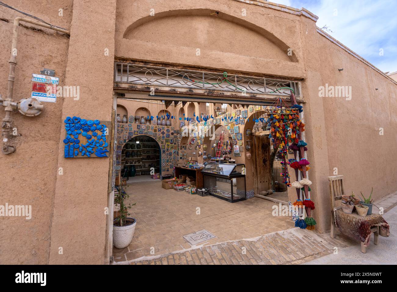 Yazd, Iran - 2024-03-03: A local decoration shop displays vibrant ...