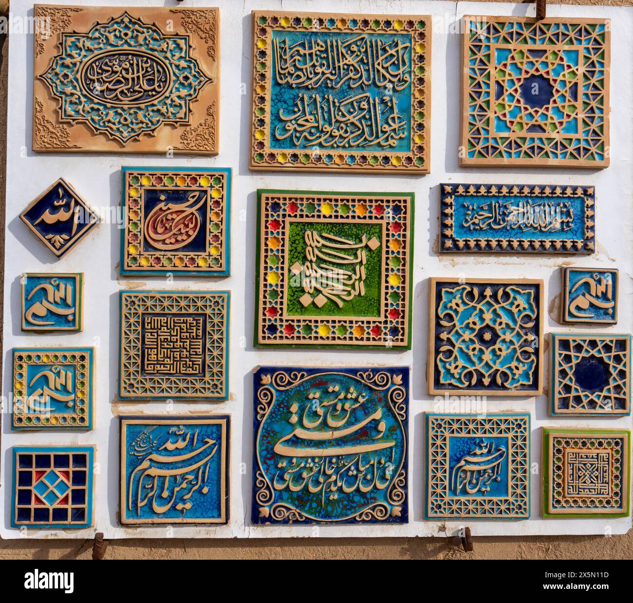 Yazd, Iran - 2024-03-03: Vibrant display of traditional Persian tiles ...
