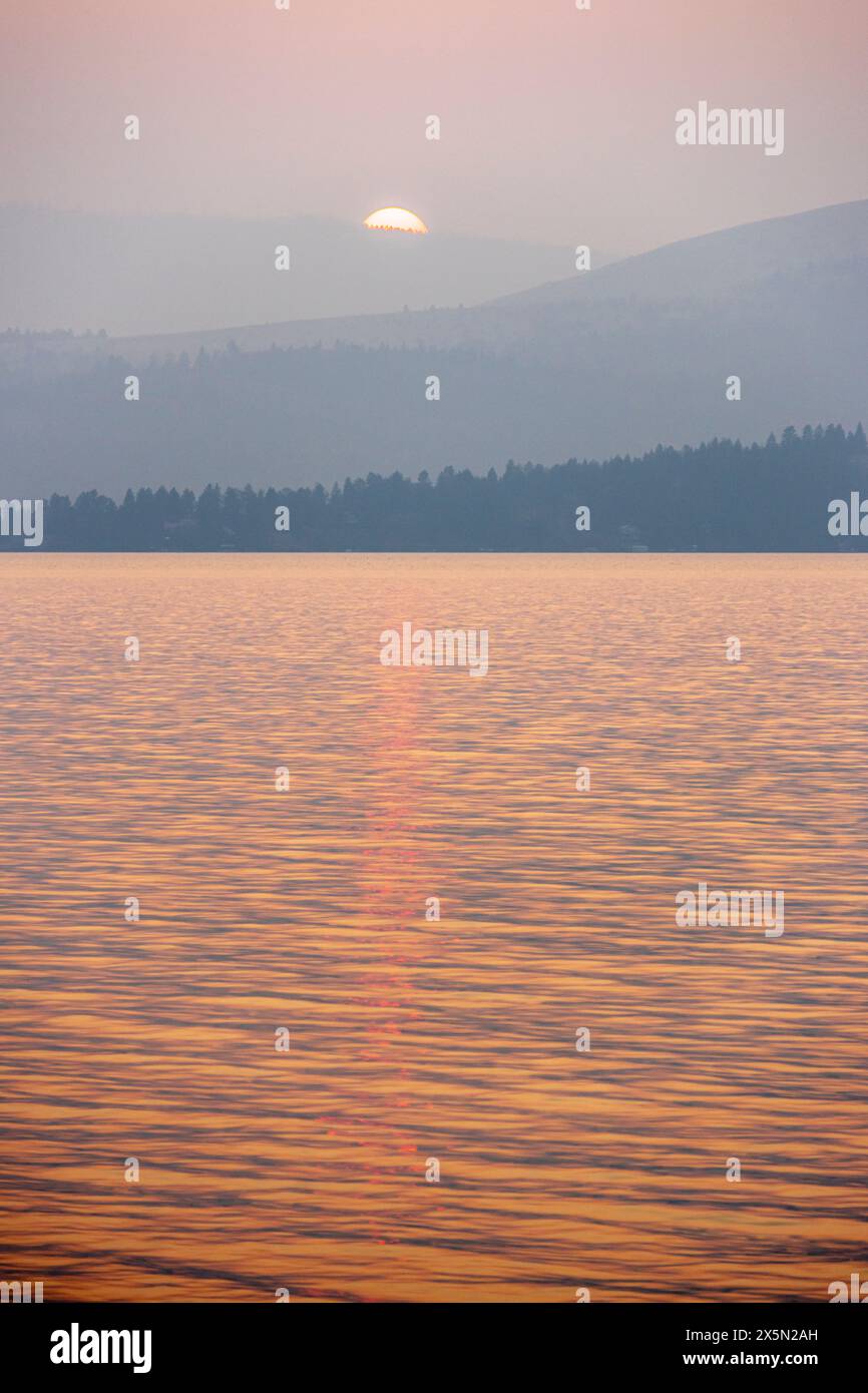 USA, Montana, Flathead Lake. sunset during wildfire smoke Stock Photo - Alamy