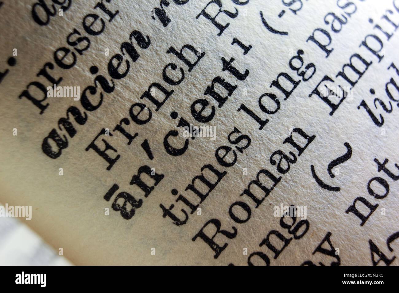 Word ancient on dictionary page, macro close-up Stock Photo - Alamy
