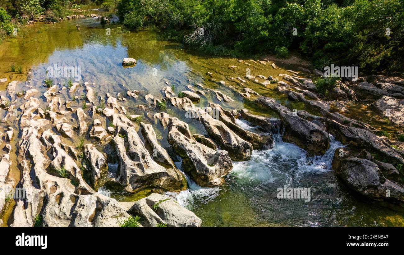 Scenic aerial view of Sculpture Falls via Barton Creek Greenbelt Trail ...