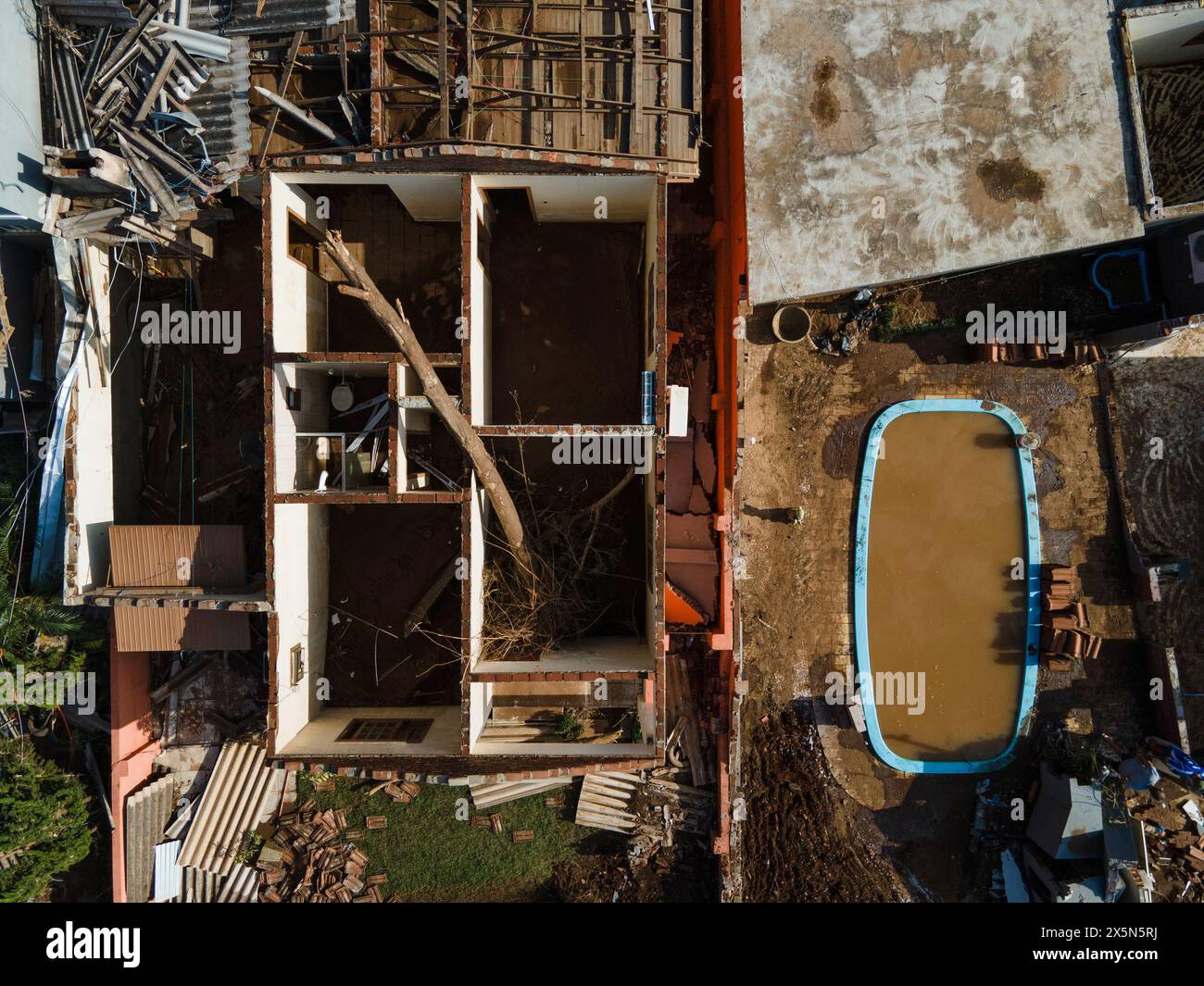Lajeado, Brazil. 09th May, 2024. Tree trunks protrude from a house ...