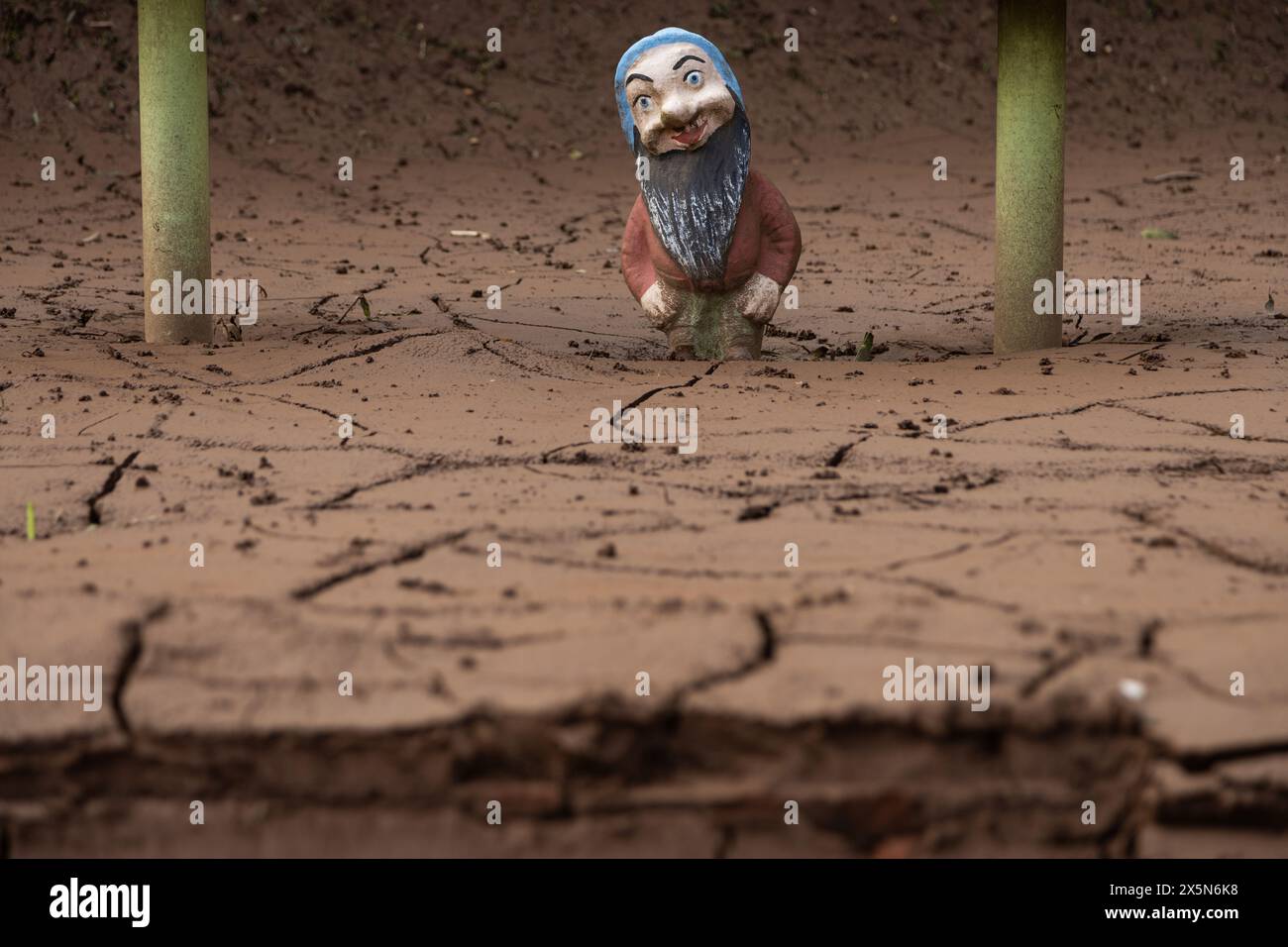 Colinas, Brazil. 09th May, 2024. A garden gnome stands in the mud after ...