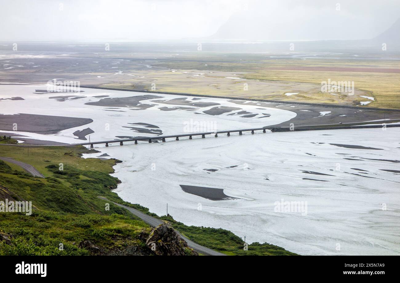 Landscape with a road bridge across the Jokulsa river in Iceland ...