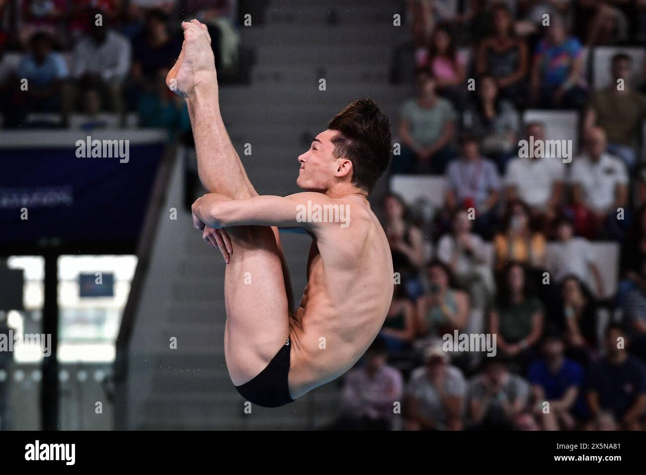 US' Tyler DOWNS competes for Men's 3m Springboard during the ...