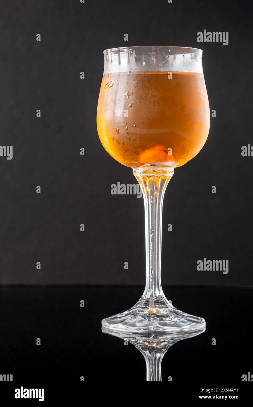 Glass of Waterloo cocktail on the black background Stock Photo - Alamy