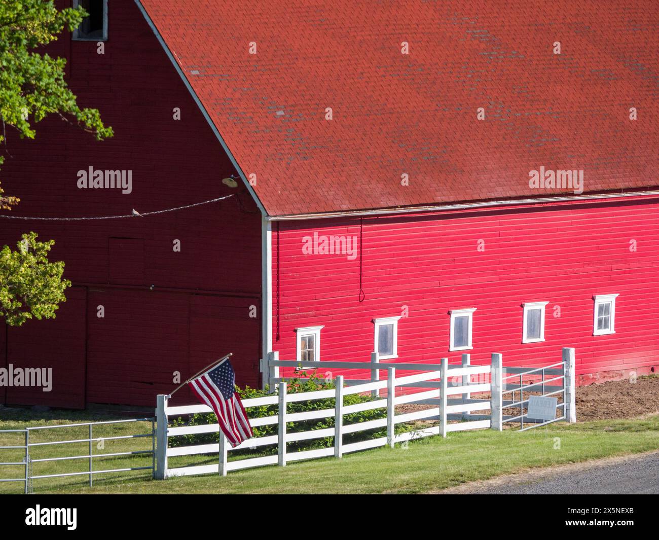 USA, Washington State, Palouse. Close-up of a red barn with an American ...
