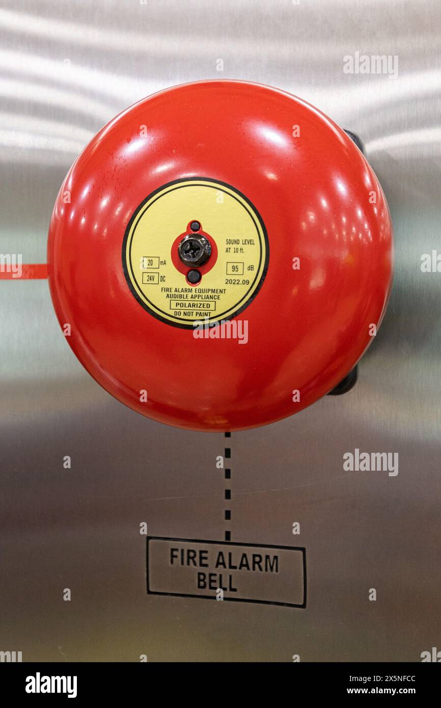 Fire alarm bell on the wall of hotel Stock Photo - Alamy