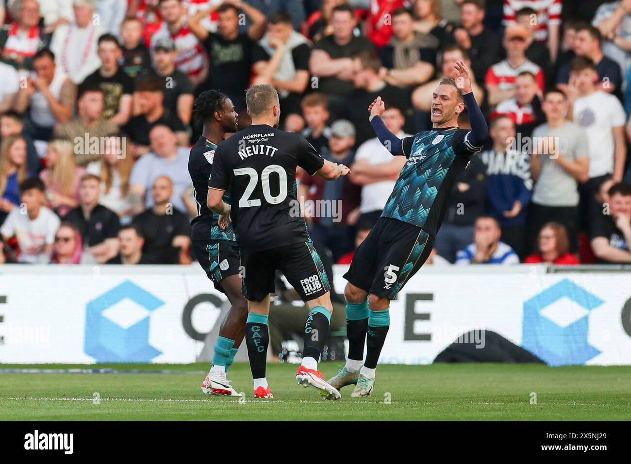 Crewe Alexandra defender Mickey Demetriou (5) scores a GOAL 0-1 and ...