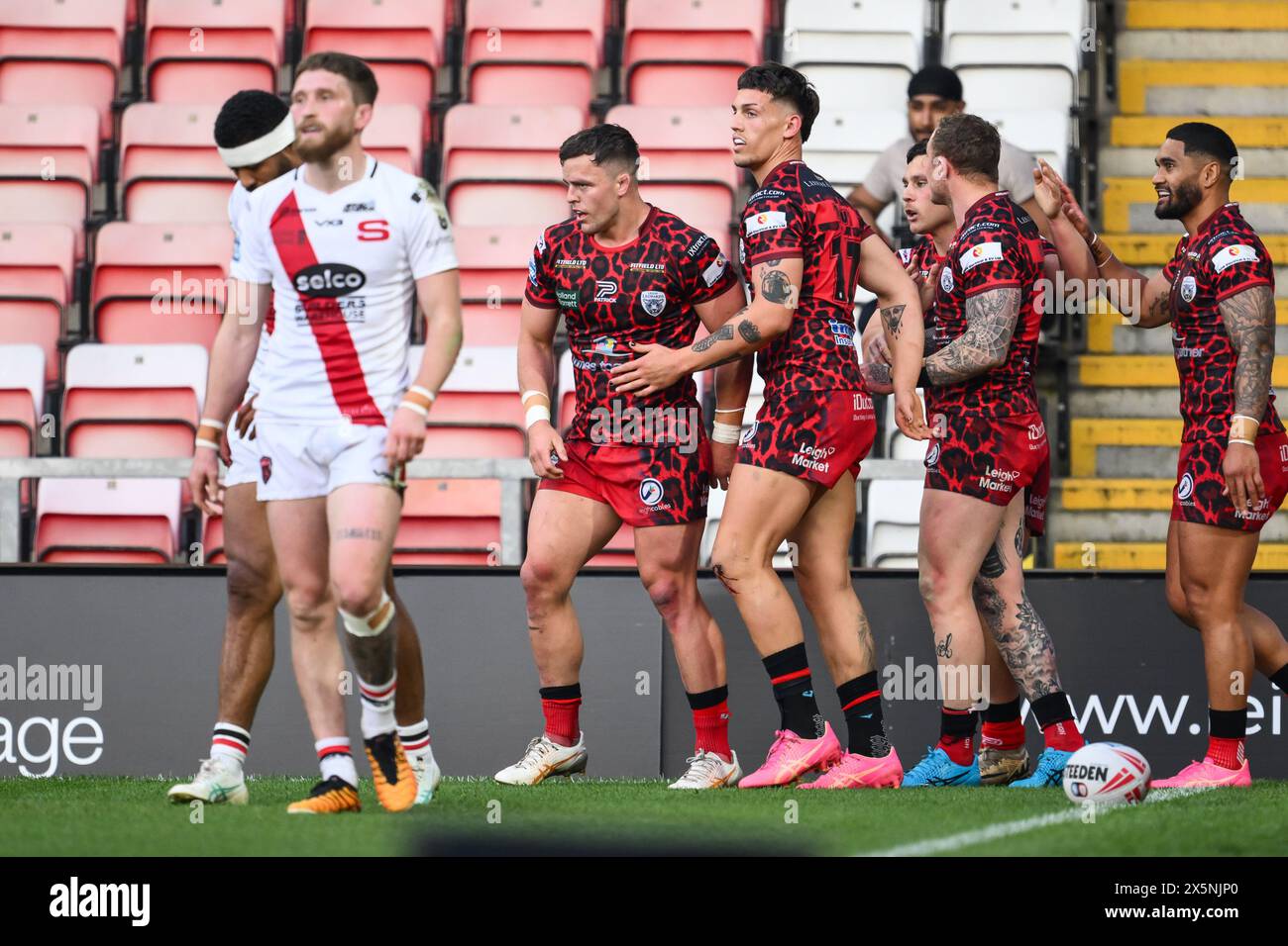 Josh Charnley of Leigh Leopards celebrates his try during the Betfred ...