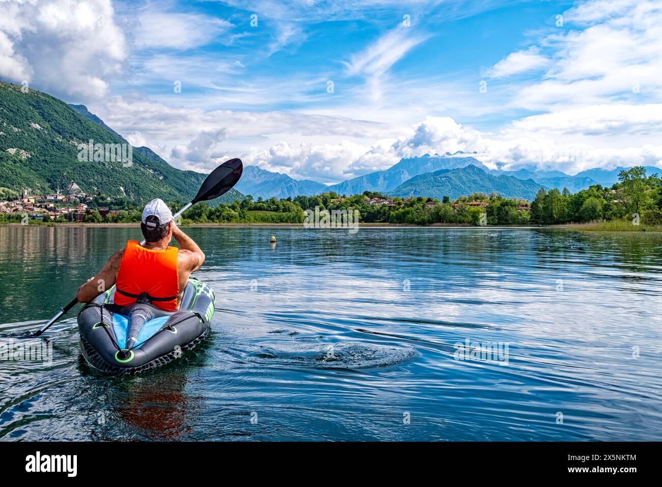 Canoeing scene on Lake Pusiano Stock Photo - Alamy
