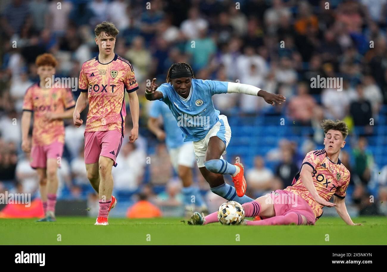 Manchester City's Joel Ndala challenges by Leeds United's Connor ...