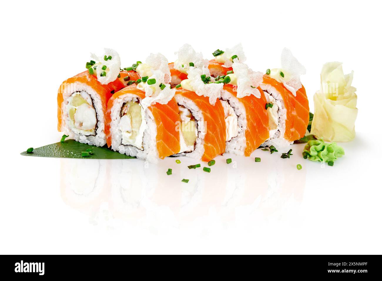 Salmon sushi rolls with tiger shrimp, cream cheese and avocado topped ...